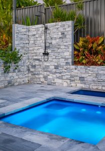 Tips For Adding An Outdoor Shower To Your Poolside - Barrier Reef Pools